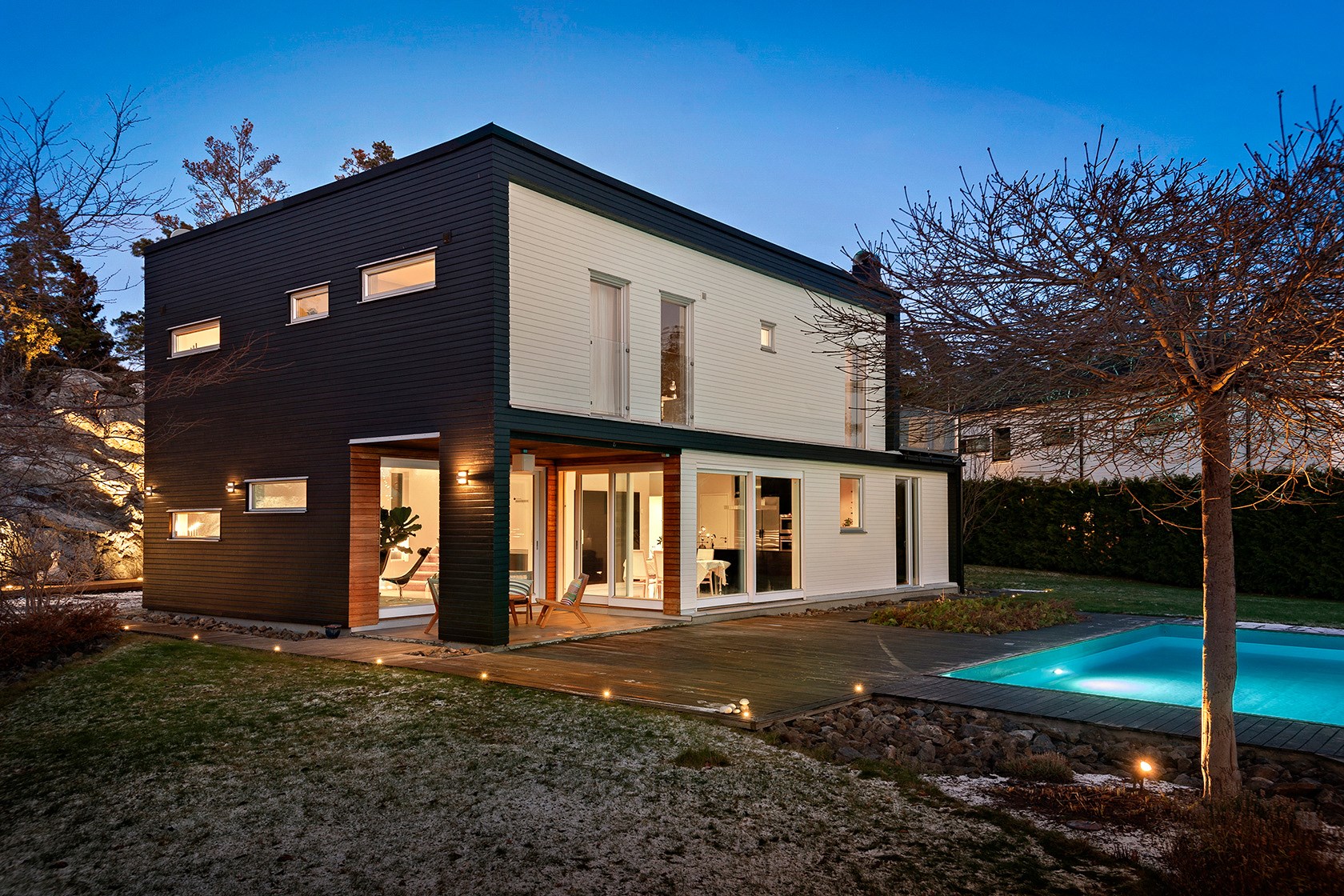 Une maison cube au design soft par Real Living en Suède