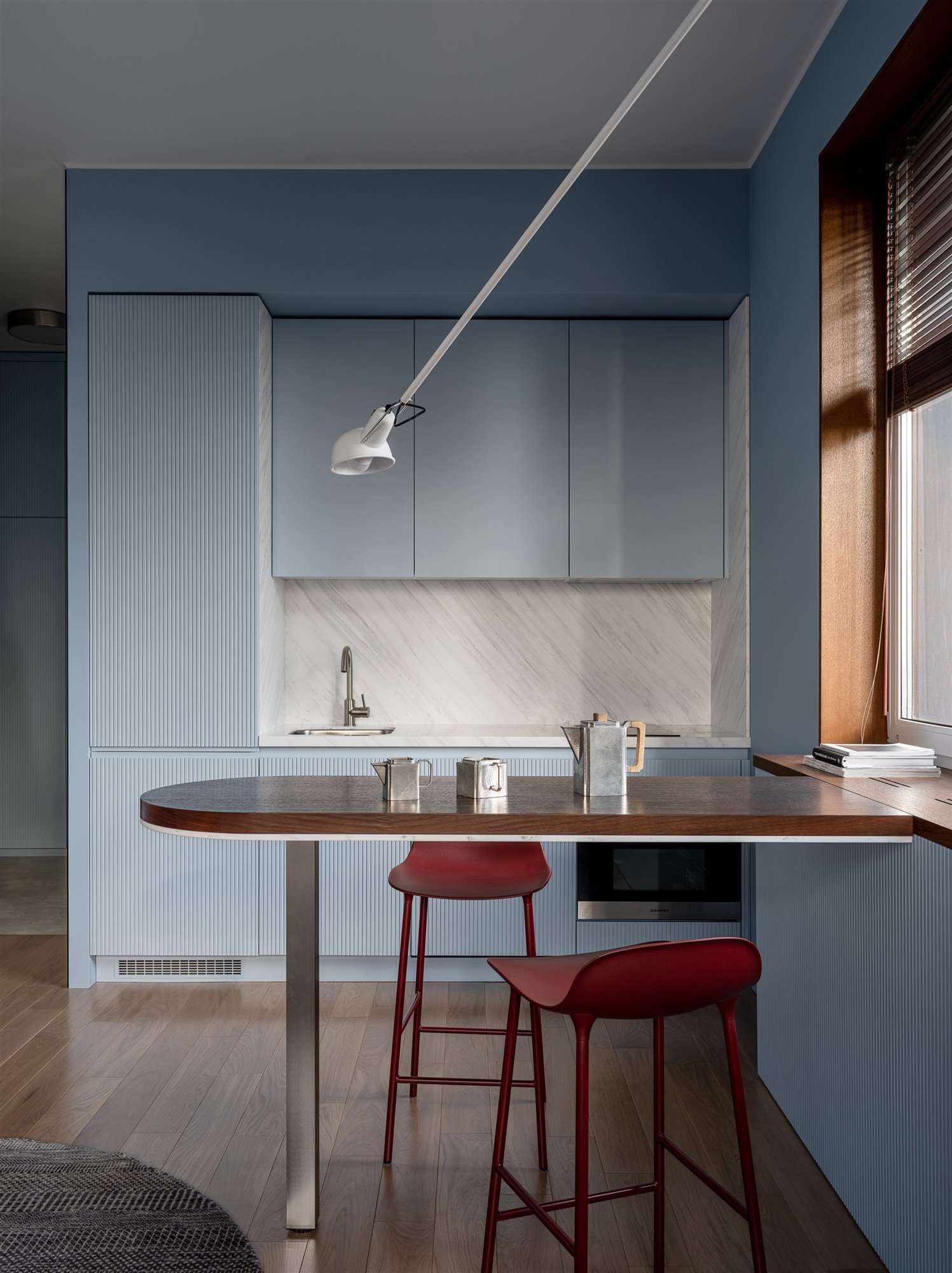 Un appartement de 29m2 sous le signe du design et du bleu